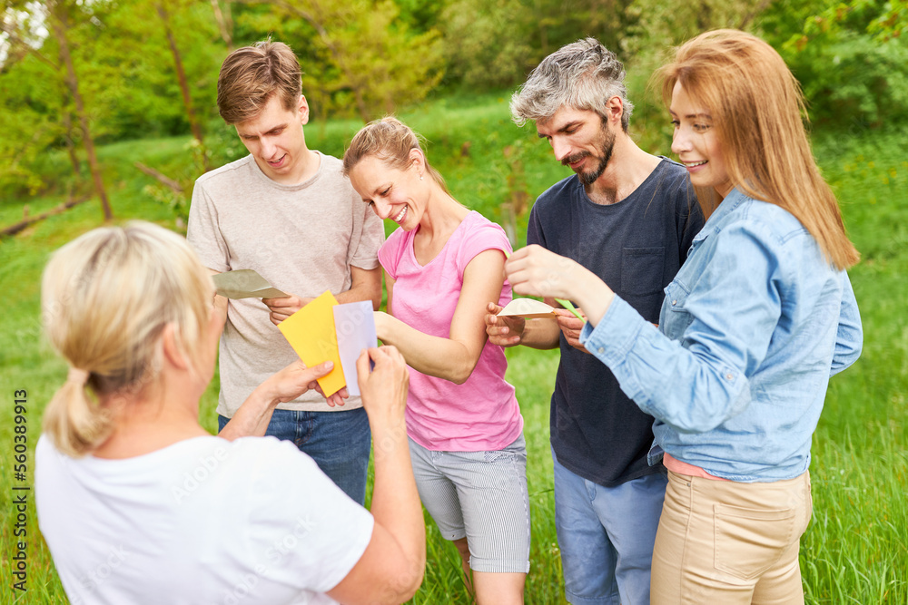 Group of people playing creative game with colorful cards Stock Photo ...