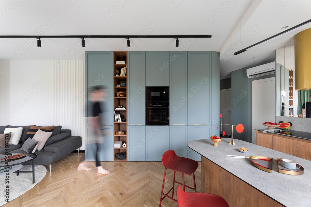 Contemporary design of living room interior with wooden kitchen island ...