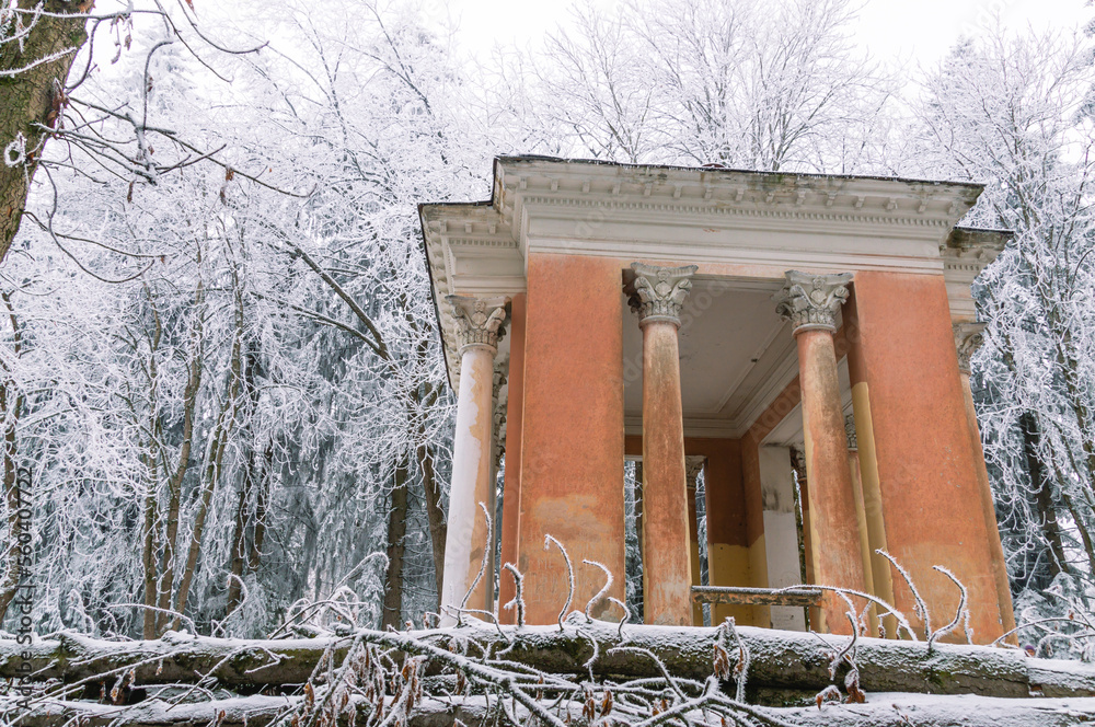 An architectural ancient structure with columns and stucco. The ...