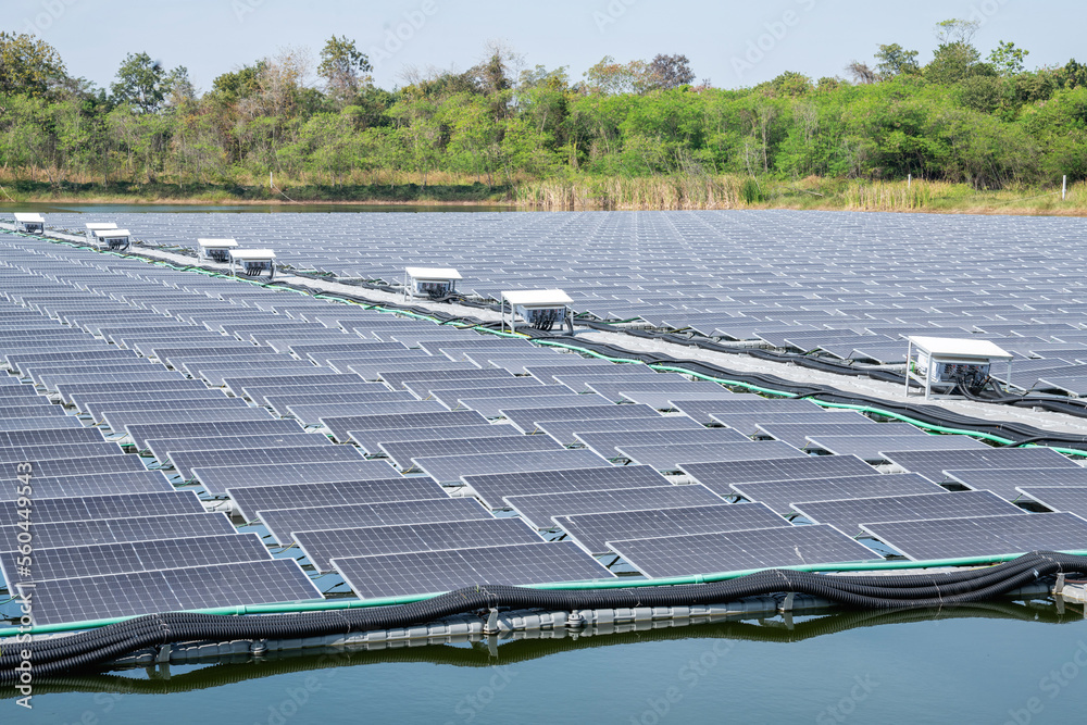 Solar power plant farm on beautifull lake. Floating solar panels ...