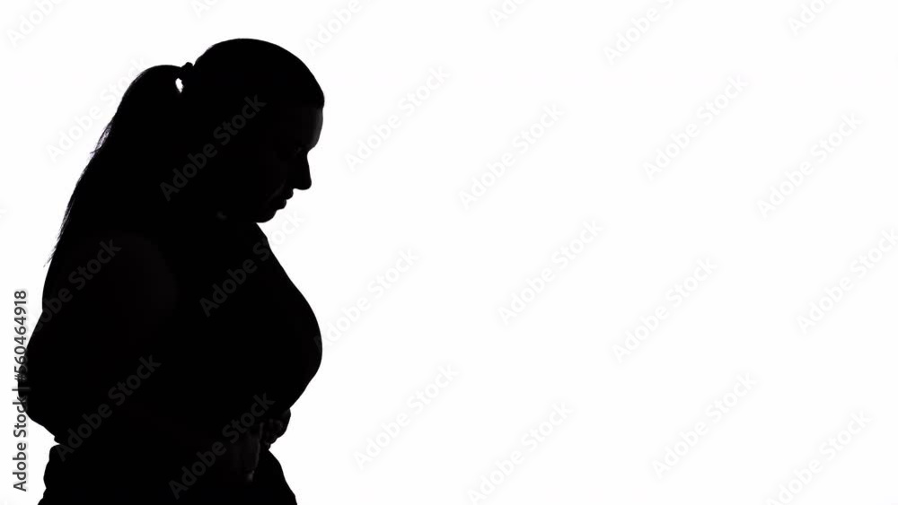 Vidéo Stock Depressed obesity. Female silhouette. Body shaming. Upset ...