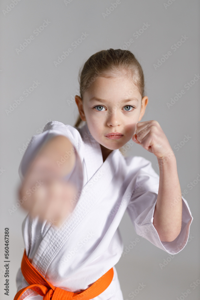 Little girl sparring, punch in karate, close-up portrait. Stock Photo ...