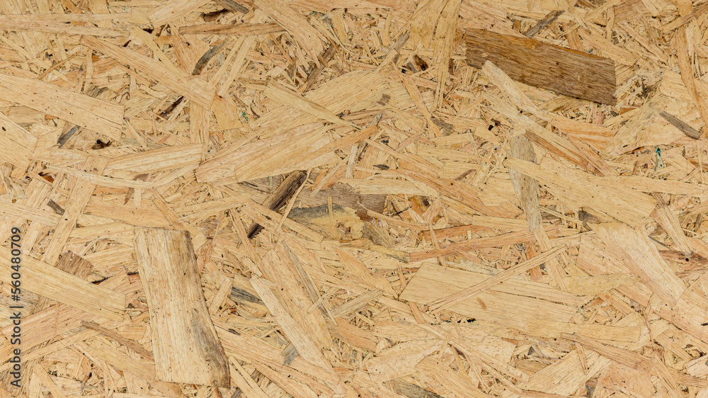OSB wood (Oriented strand board) background. OSB texture. Chipboard sheet. Plywood texture and ...