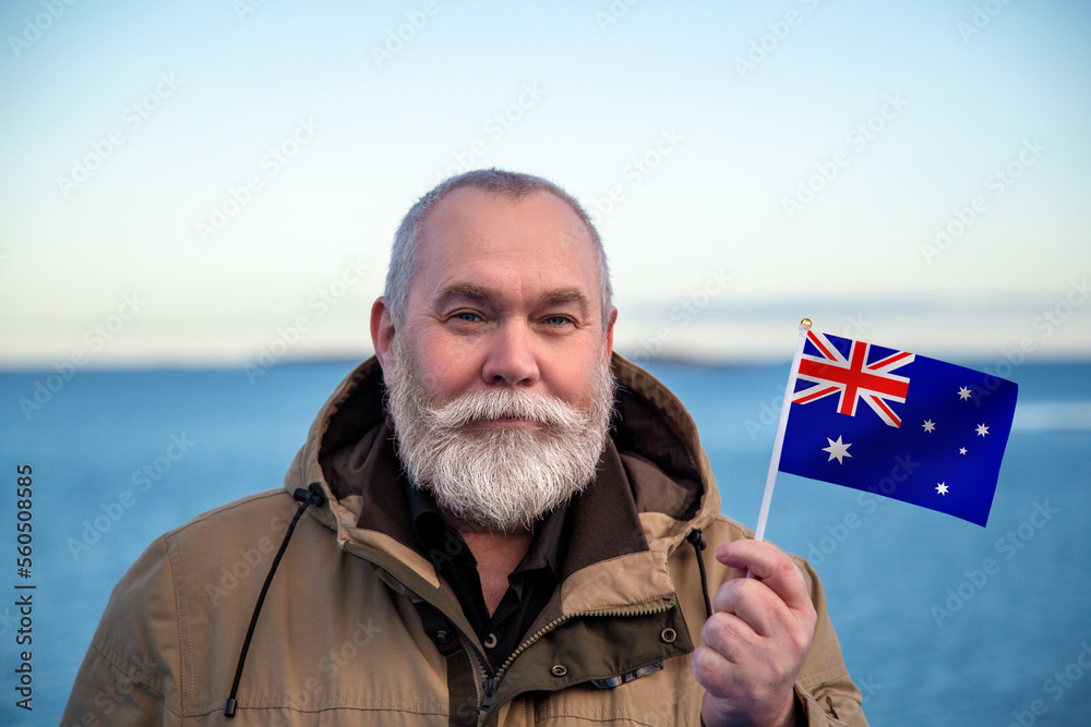 Man holding Australia flag. Portrait of older man with a national ...