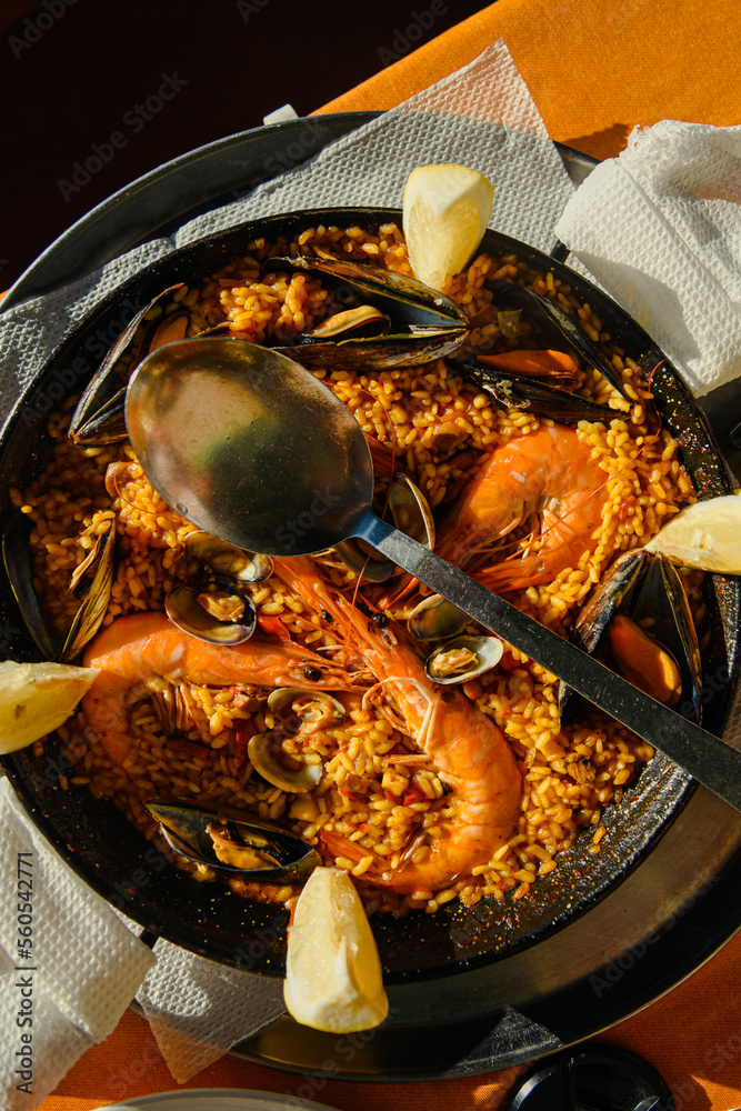 Traditional Paella served at restaurant seafood paella in the fry pan ...
