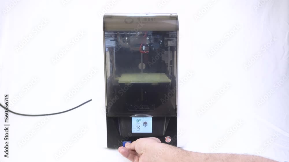 Inserting a SD Card into a 3D Printer Stock Video | Adobe Stock