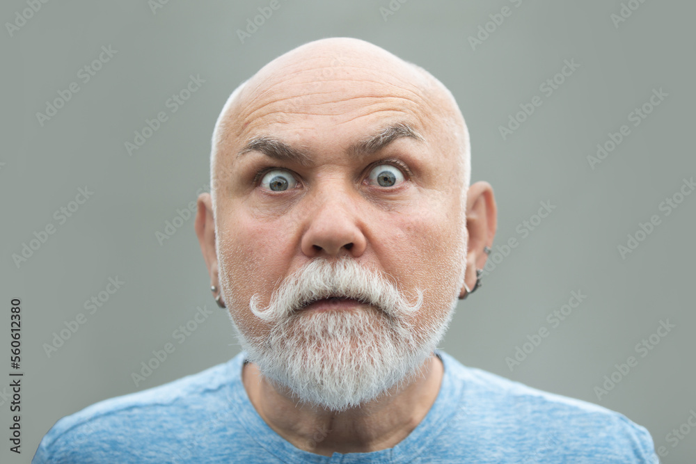 Surprised old mature man face. Closeup emotional portrait of an old ...