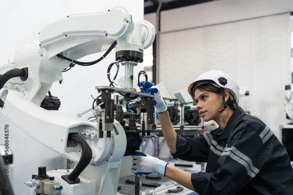 Female engineer control autonomous mobile robot or AMR in the ...