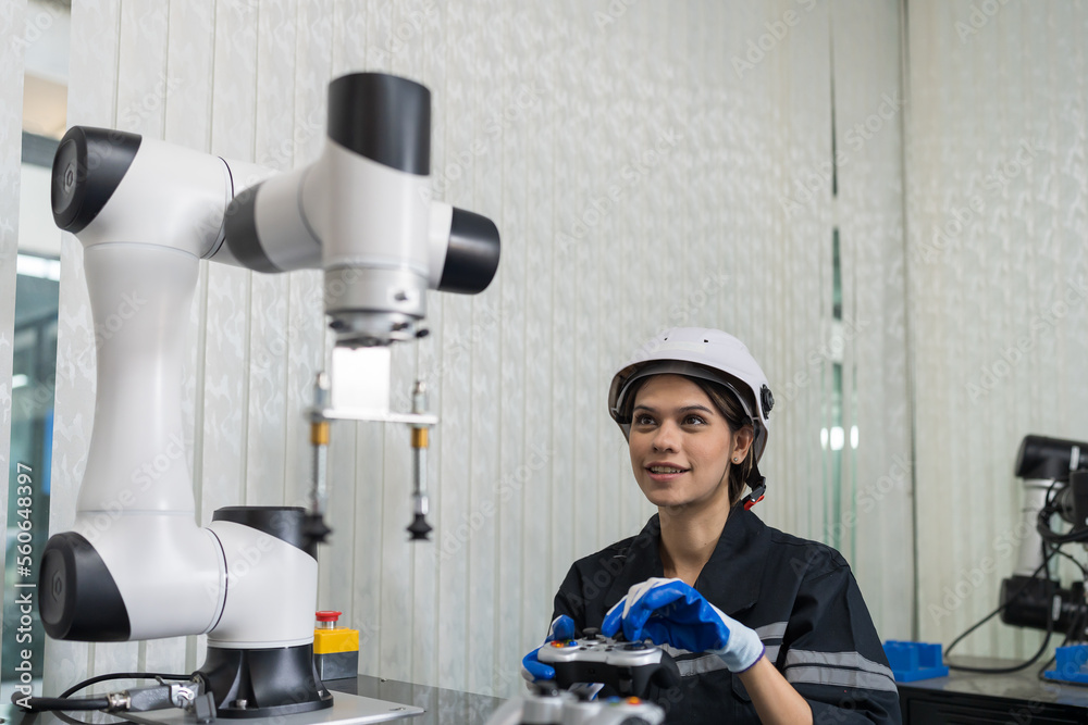 Female engineer control autonomous mobile robot or AMR in the ...