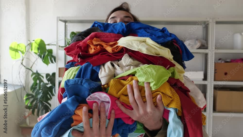 Vídeo do Stock: Fast Fashion and Textile Waste. A large pile of old ...