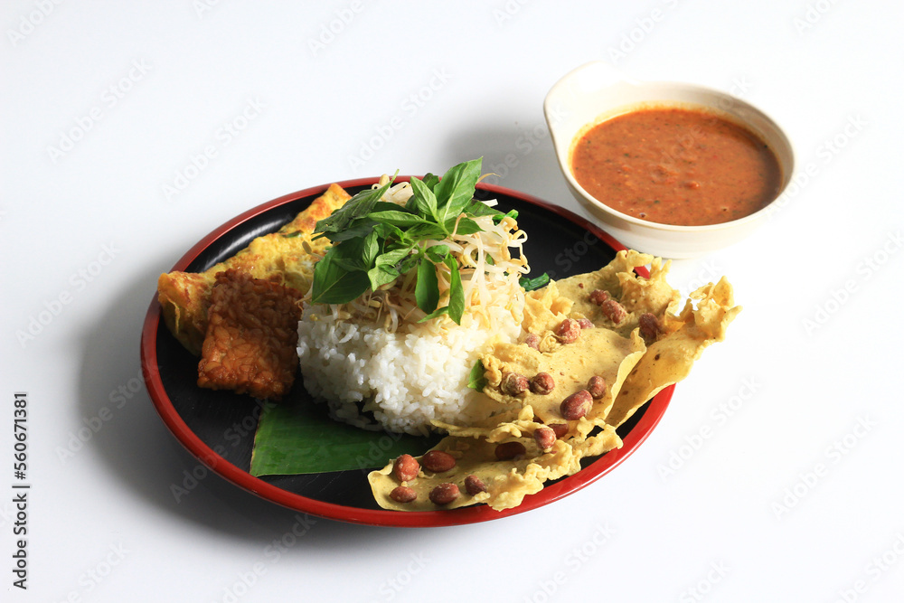 Nasi Pecel. Traditional Javanese rice dish of steamed rice with ...