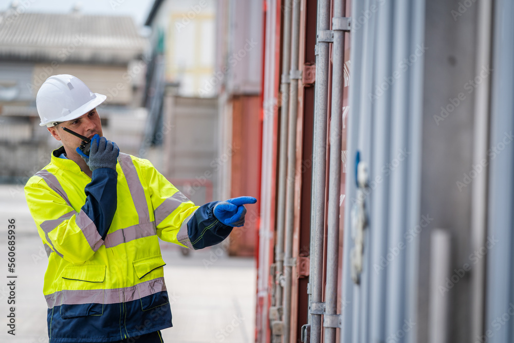 Worker check list of container cargo at container depot terminal ...