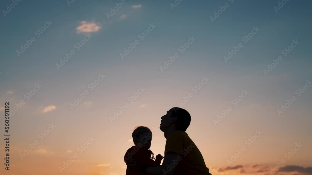 Fatherhood concept. Silhouette of father, child against background of ...