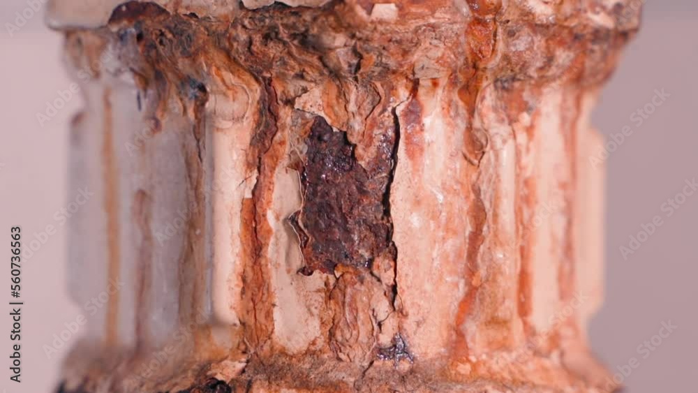 Iron old heating pipe in corrosion and smudges close-up on a blurred ...