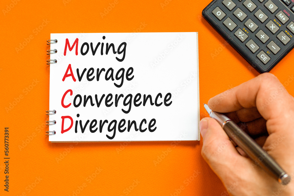 MACD symbol. Concept words MACD moving average convergence divergence on white note on beautiful ...