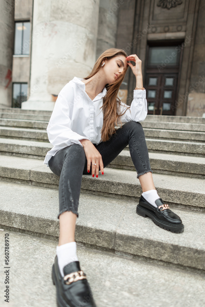 Beautiful street business model girl in fashionable elegant casual ...