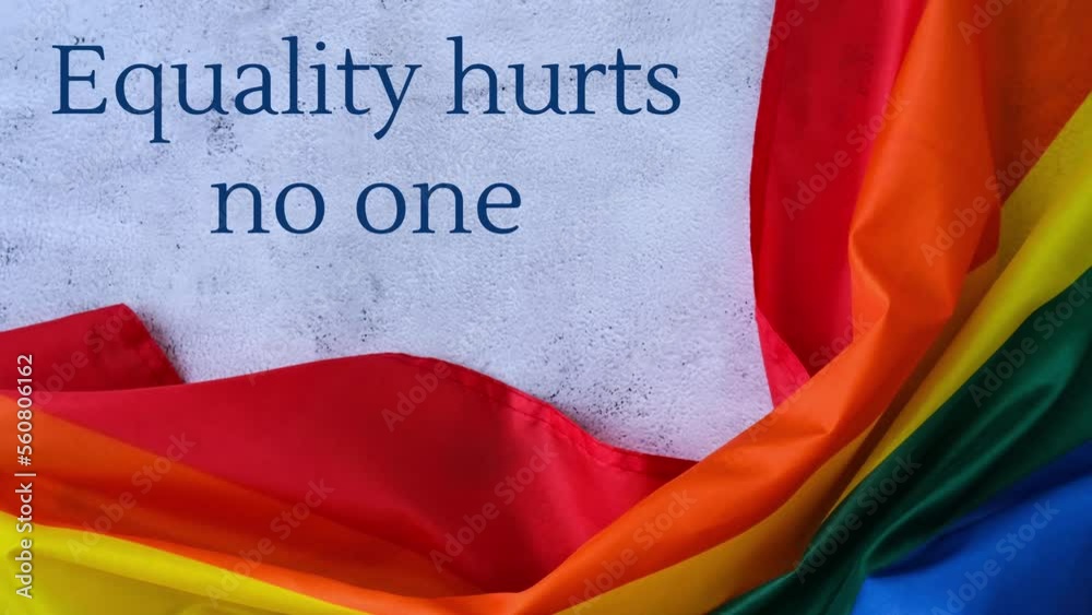 Stockvideon 4k zoom in out Rainbow flag with text EQUALITY HURTS NO ONE ...