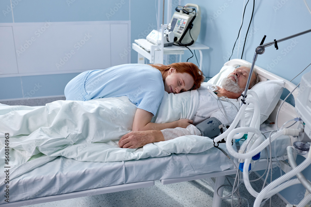 senior sick man lying in bed at hospital room after suffering accident ...