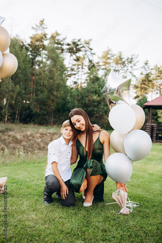 older sister and younger brother are celebrating their birthday. party ...