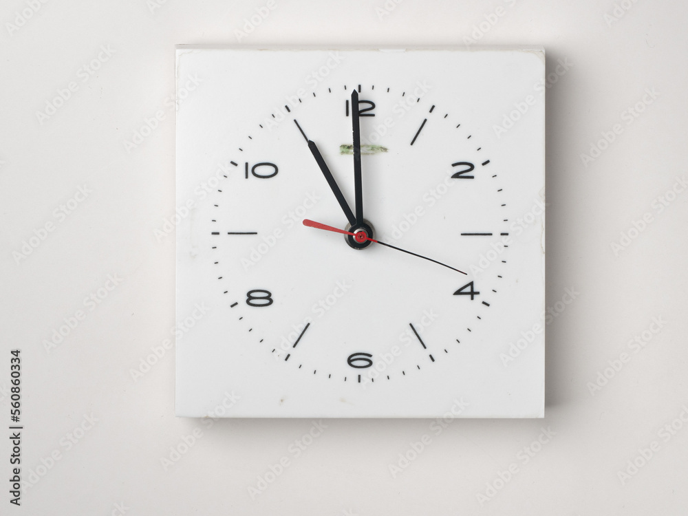 A wall clock isolated on white background. It is 11 o´clock. Stock ...