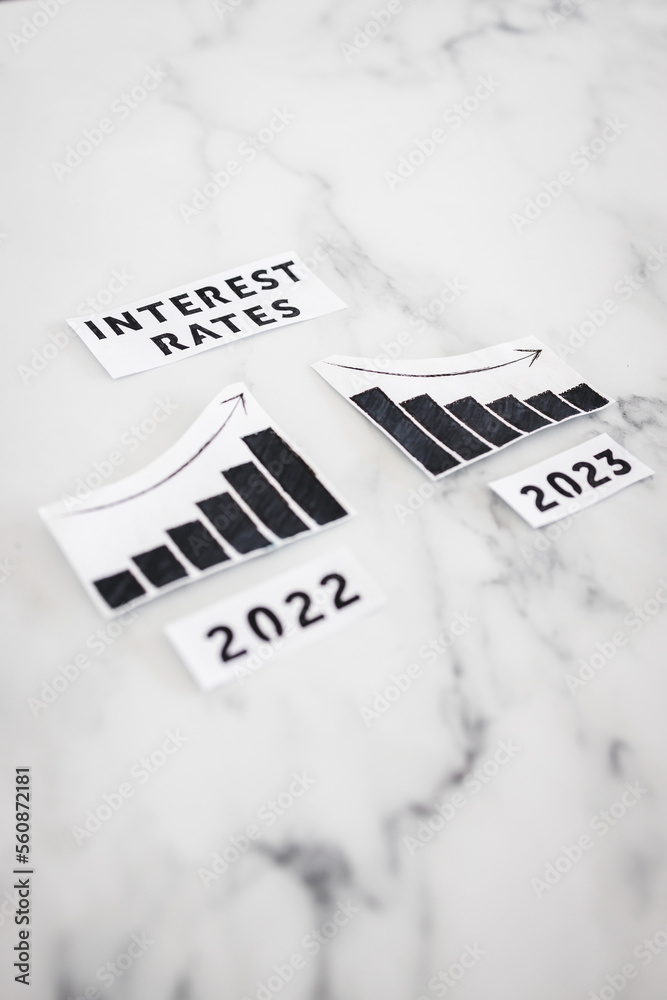 interest rates text with 2022 chart showing stats increasing and 2023 ...