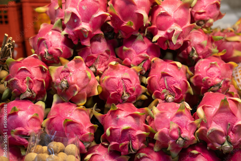 Tropical dragon eye fruit bunch. Pitahaya close-up as a background ...