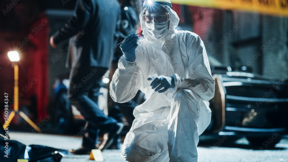 Forensics Specialist Finding Bullet Shell on Crime Scene at Night ...