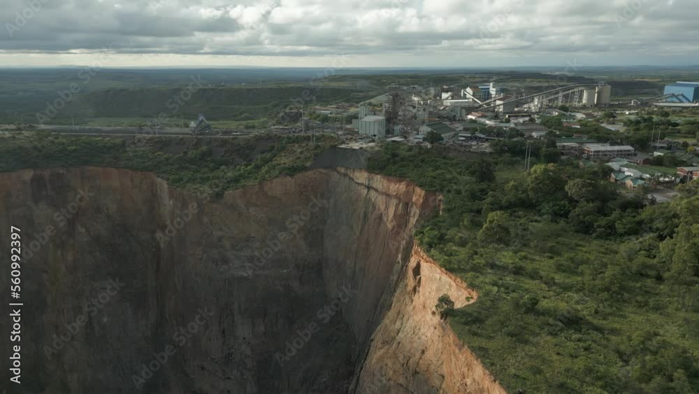 Huge steep rock cliffs in big hole of Cullinan Diamond Mine open pit ...