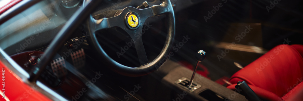Ferrari F40 steering wheel, view through the driver's window. Small ...