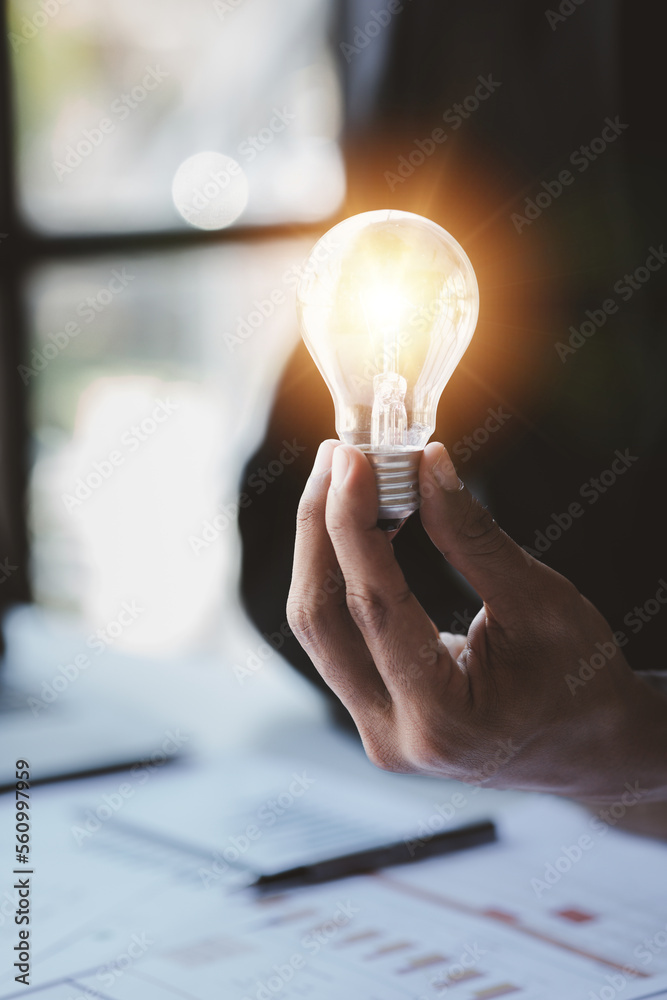 Man hold glowing light bulb, Creative new idea. Innovation ...