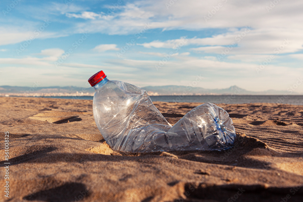 Used plastic water bottle washed up on the shore of a mediterranean ...