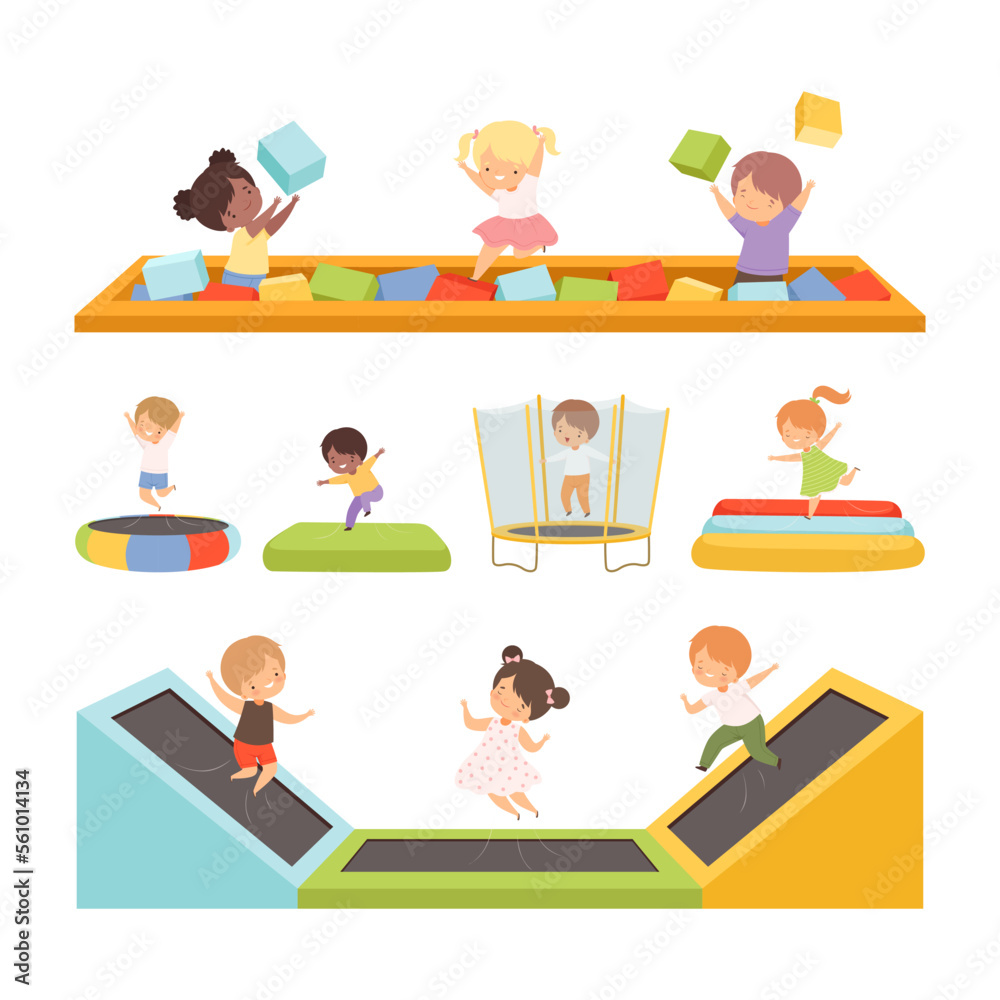 Kids playing on playground set. Cute boys and girls jumping on ...