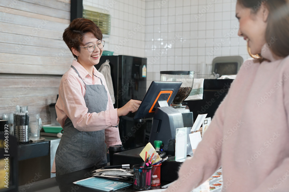 Foto de young woman wears eyeglasses smile happily while working in ...
