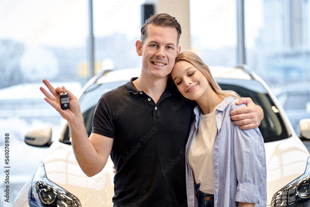 young caucasian heterosexual couple family husband and wife hugging ...