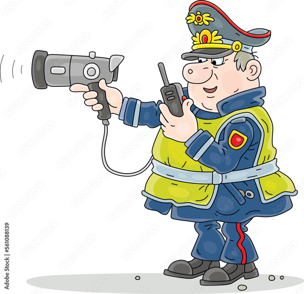Traffic policeman with a portable speed trap and a radio transmitter ...