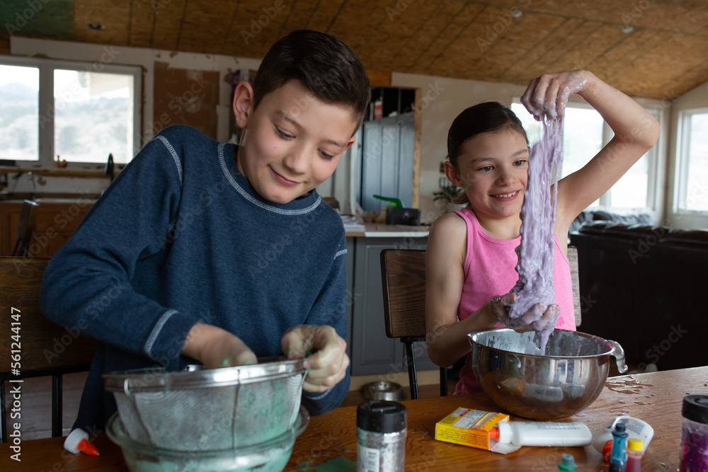 Kids playing with the slime they made Stock Photo | Adobe Stock