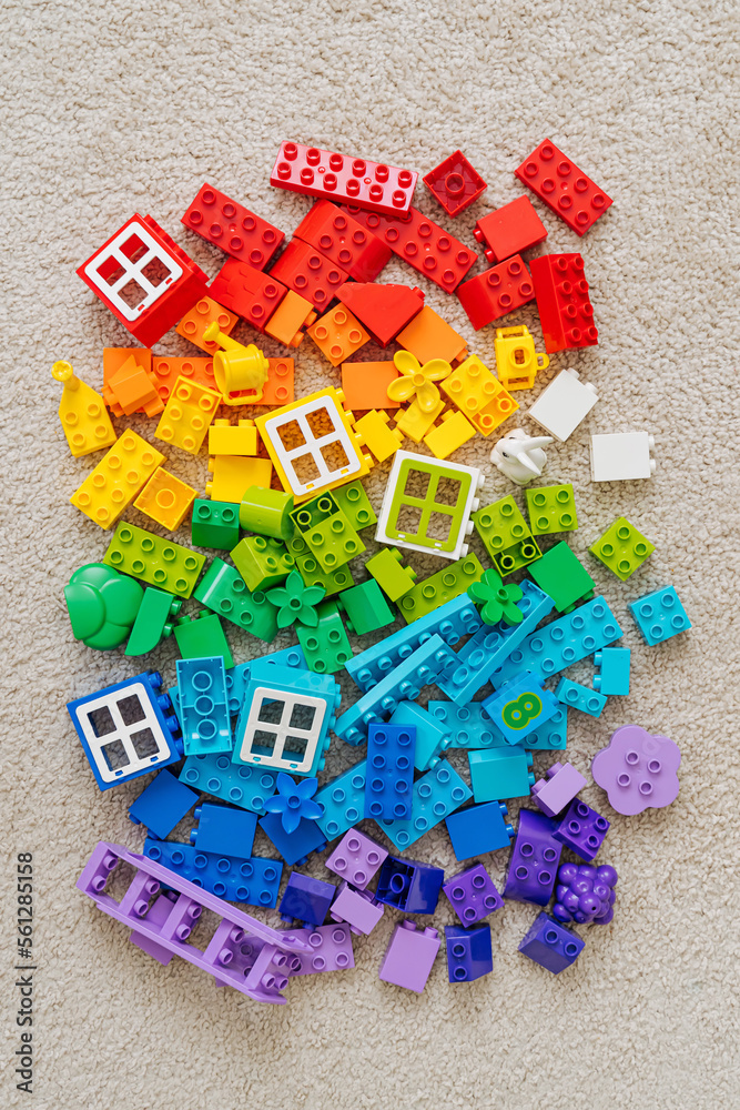 Top view of various colorful rainbow colored constructor pieces. Bright ...
