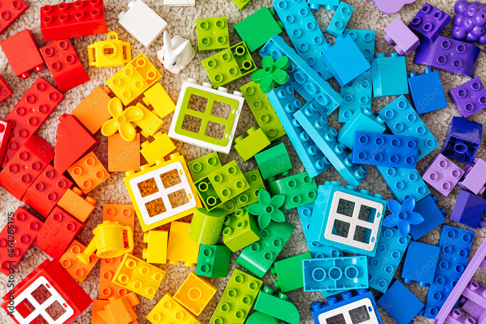 Top view of various colorful rainbow colored constructor pieces. Bright ...
