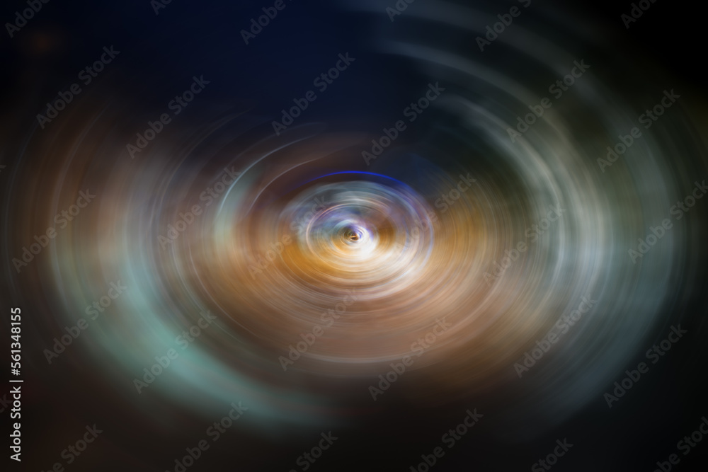 Defocused abstract dark background with bright light streaks and trails ...