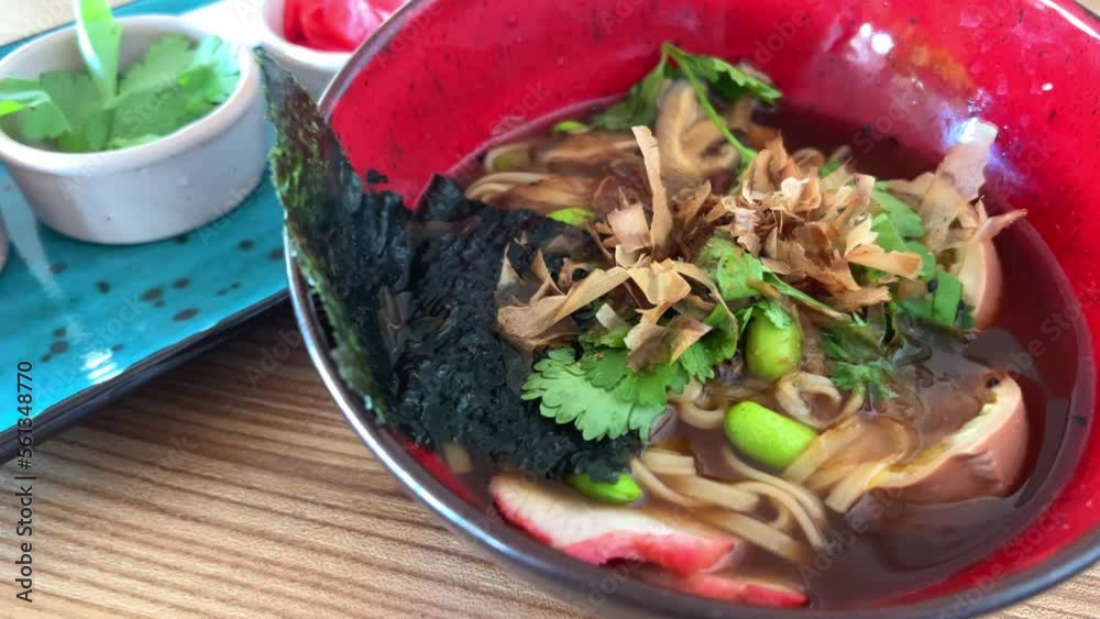 Spicy Sichuan Dandan noodles ramen with spicy dumplings combo in the ...