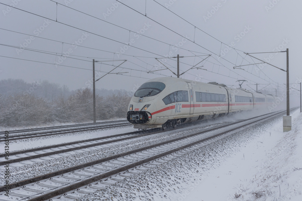 Bavaria, Germany, December 2022, ICE, german train drives through a ...