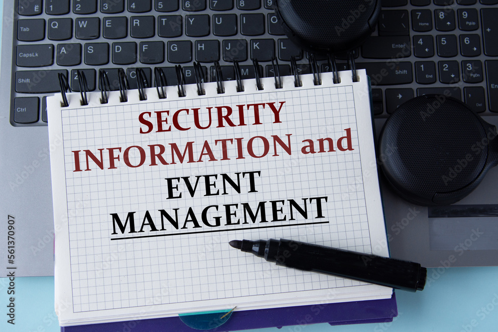 SECURITY INFORMATION and EVENT MANAGEMENT - words on a white sheet on ...