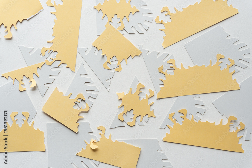 set of cut paper shapes (some with fringe edge) on blank paper Stock ...