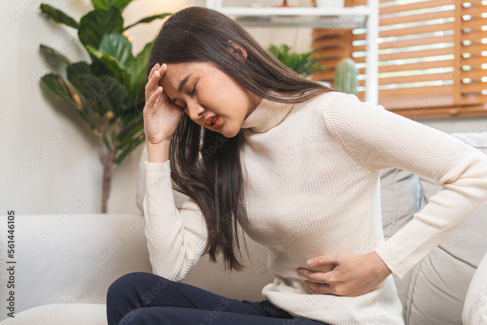 Flatulence asian young woman, girl hand in stomach ache, suffer from ...