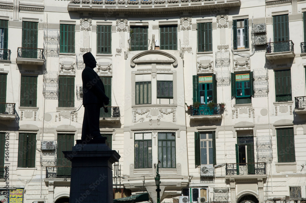 Egyptian city architecture and statue in Midan Talaat Harb, Downtown ...