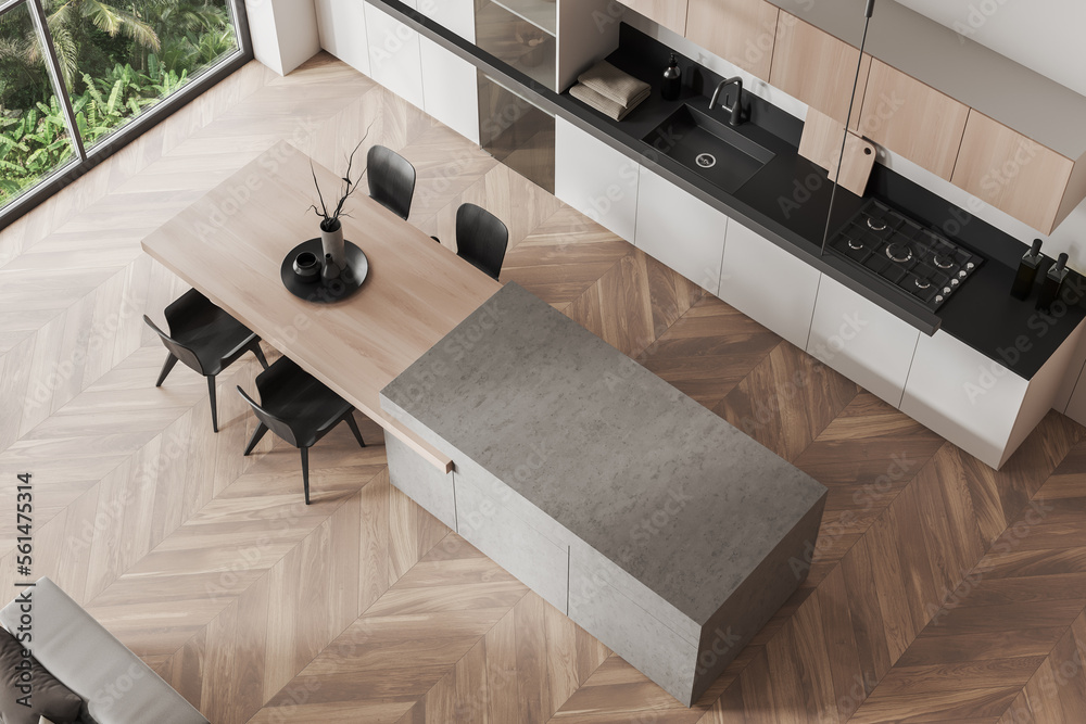 Top view of stylish kitchen interior with eating and cooking area near ...