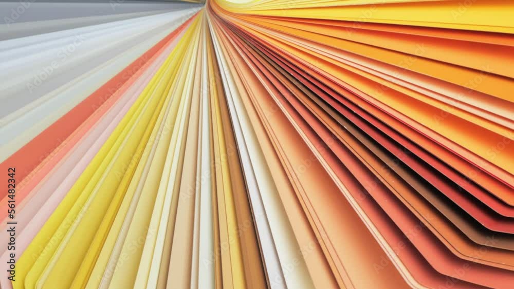 The graphic designer chooses colors from the color palette guide ...