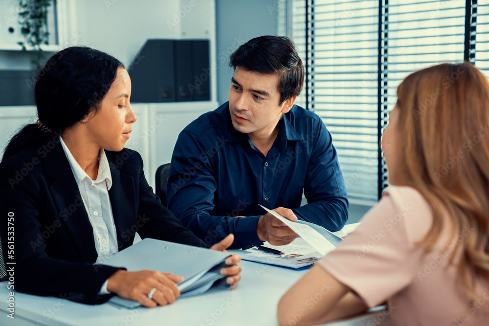 A young female asian candidate tries to impress her interviewer by ...