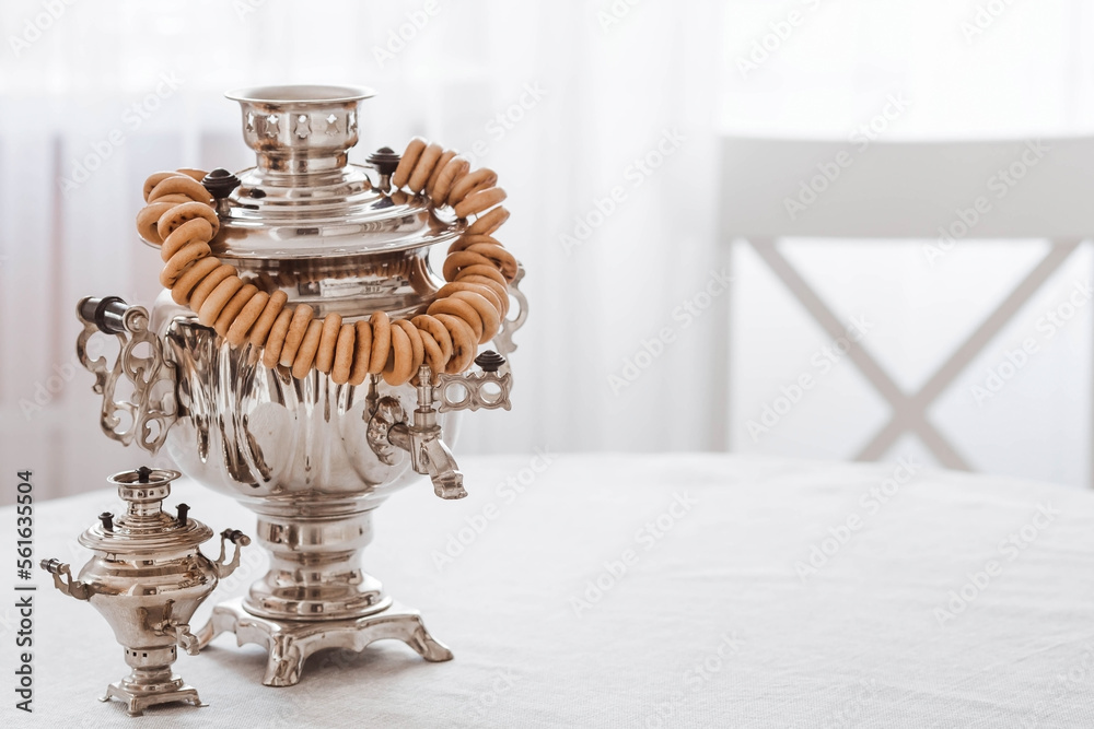 Russian traditions. Tea drinking with a samovar. Still life with bagels ...