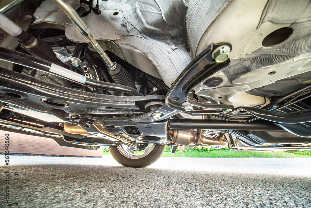 Bottom car view for safety inspection. Concept of garage services, used ...